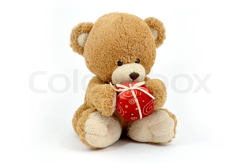 Cute teddy bear doll on white ... | Stock image | Colourbox