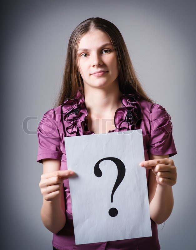 Girl holding a question mark | Stock image | Colourbox