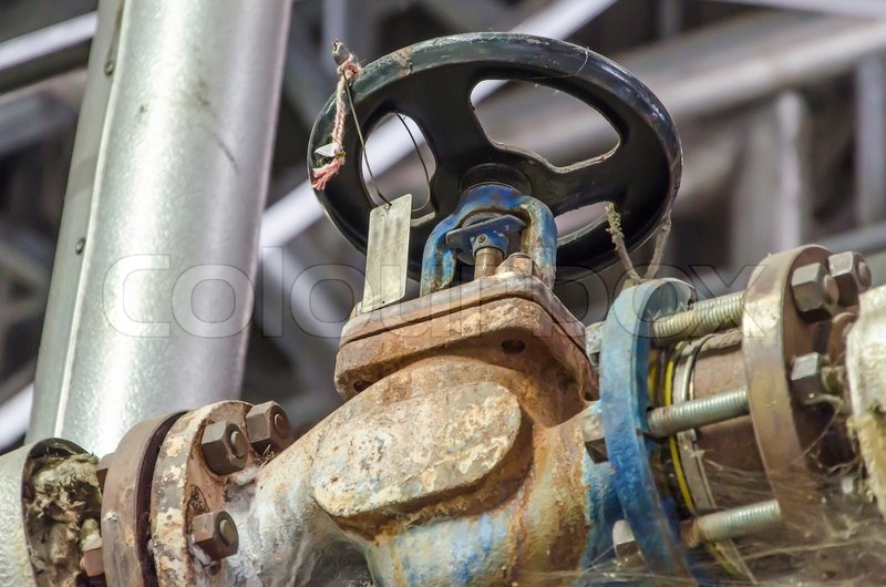 Rust manual valve for process steam | Stock image | Colourbox