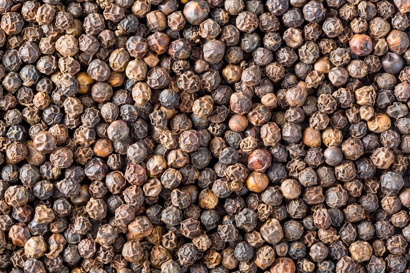 Close up whole black pepper texture ... | Stock image | Colourbox