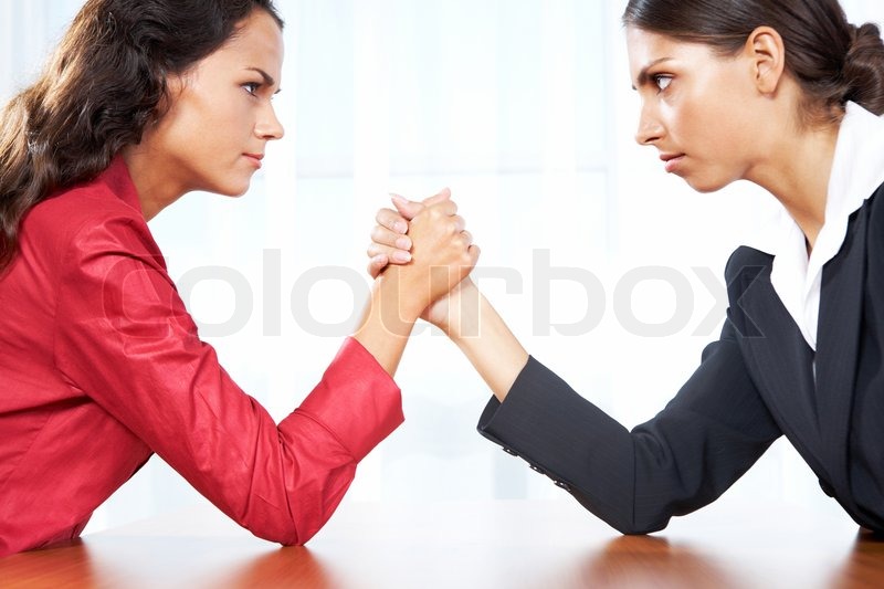 Profile of two women in struggle while ... | Stock image | Colourbox