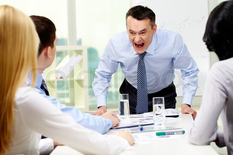 Angry businessman shouting at his ... | Stock image | Colourbox