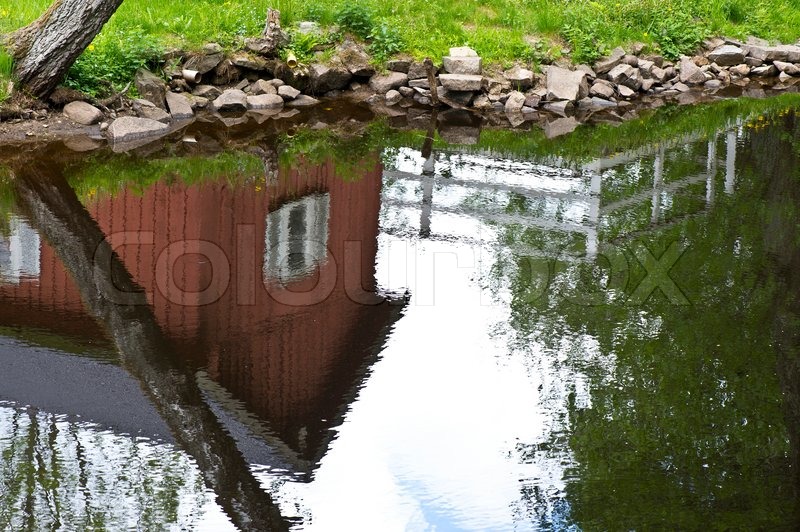 Water reflection of smalll house or ... | Stock image | Colourbox