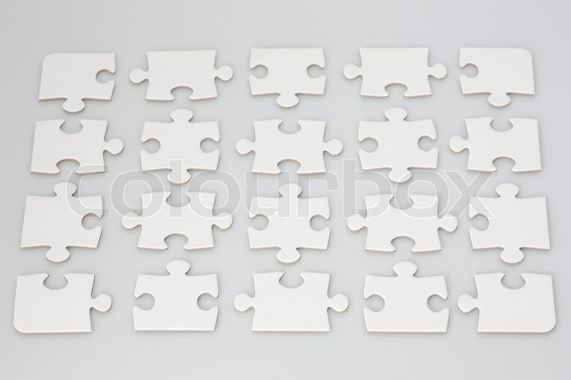 All white jigsaw puzzle with pieces ... | Stock image | Colourbox