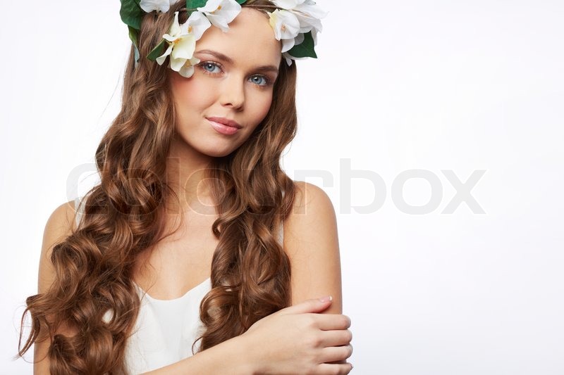 Charming young woman giving a look to ... | Stock image | Colourbox