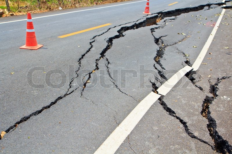 Cracked surface of an asphalt road | Stock image | Colourbox
