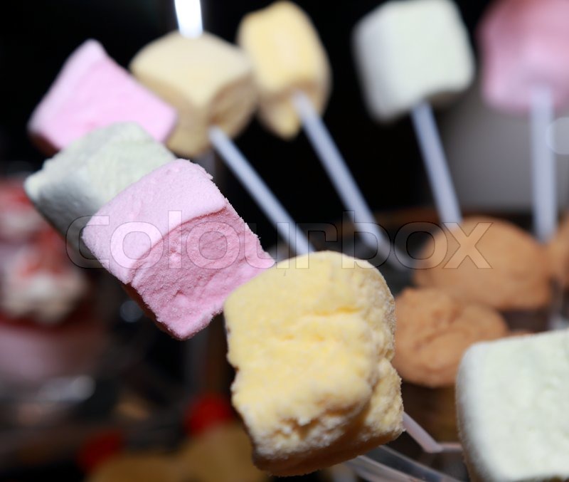 Marshmallow in a stick for chocolate ... | Stock image | Colourbox