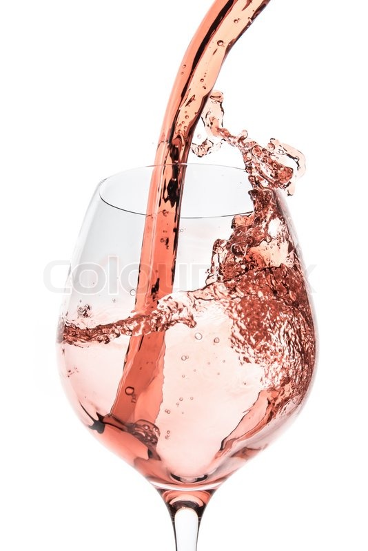 Rose wine splashing on white background | Stock image | Colourbox