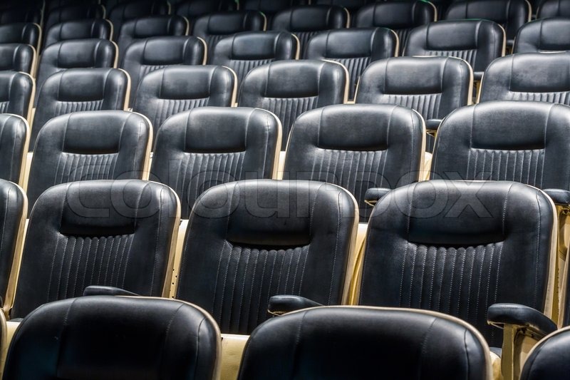 Theater seats in rows from front view | Stock image | Colourbox