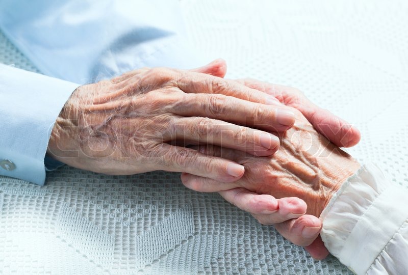 Old people holding hands. Closeup. | Stock Photo | Colourbox