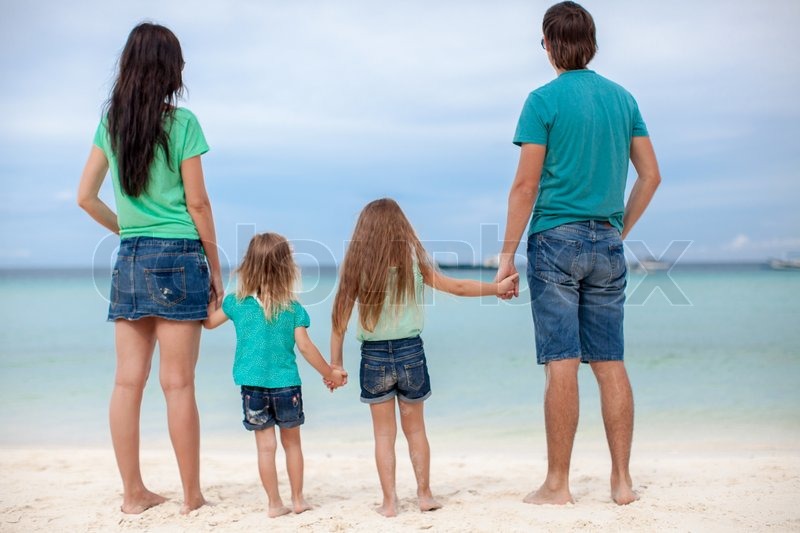 Back view of beautiful family with two ... | Stock image | Colourbox