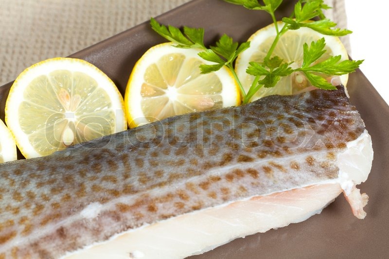 Fresh cod fillet with fresh lemon ... | Stock image | Colourbox