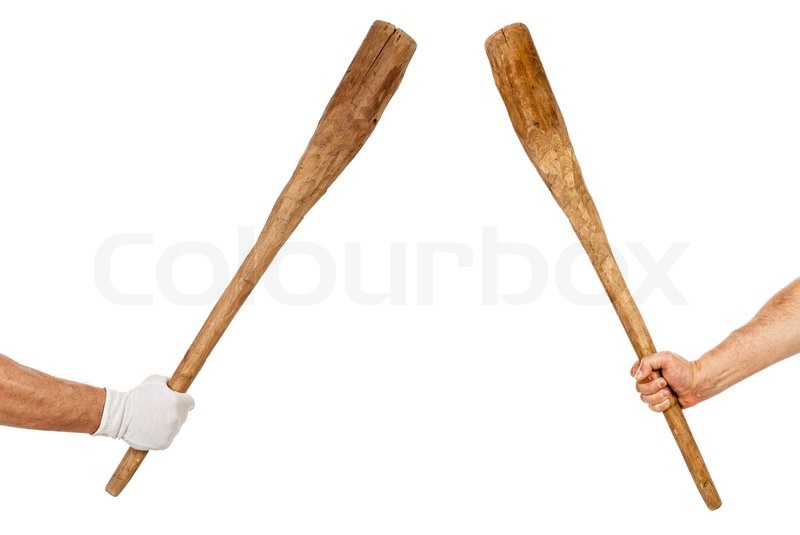 Two hands holding bats | Stock Photo | Colourbox