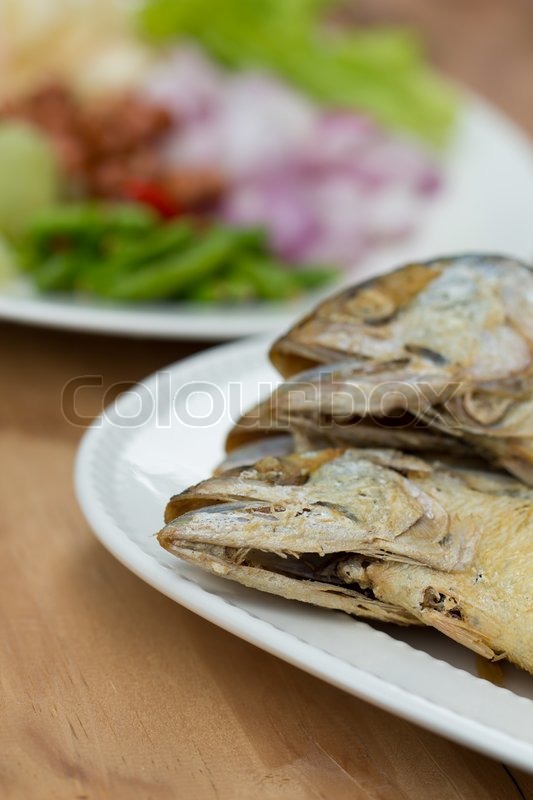 Fried fish with side dishes such as ... | Stock image | Colourbox