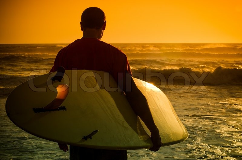 Surfer watching the waves | Stock image | Colourbox