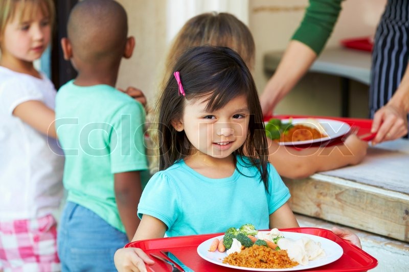 Elementary Pupils Collecting Healthy ... | Stock image | Colourbox