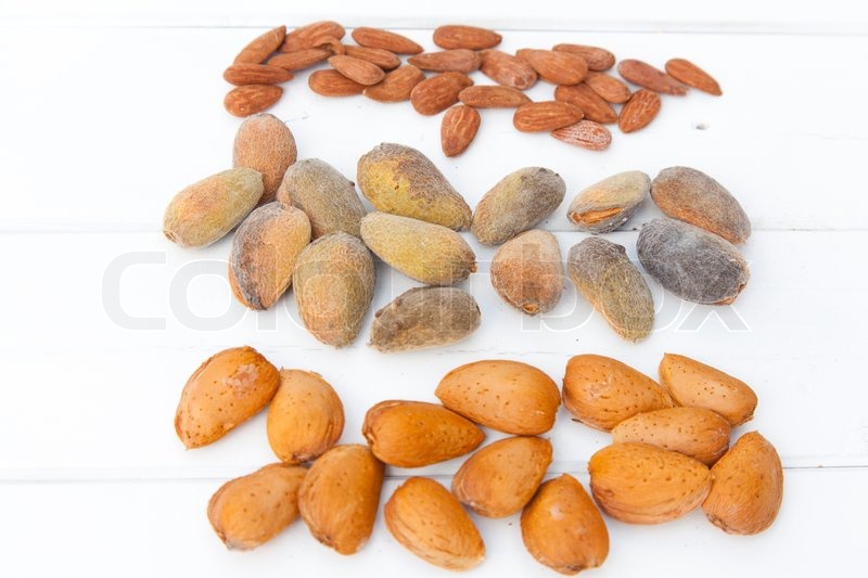 Process from the husk peeled almonds ... | Stock image | Colourbox