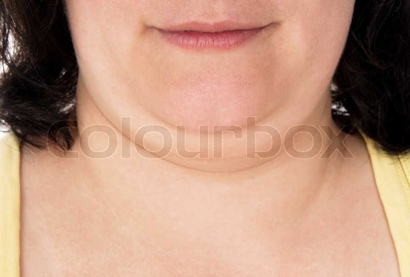 Girl shows off his big chin isolated on ... | Stock image | Colourbox