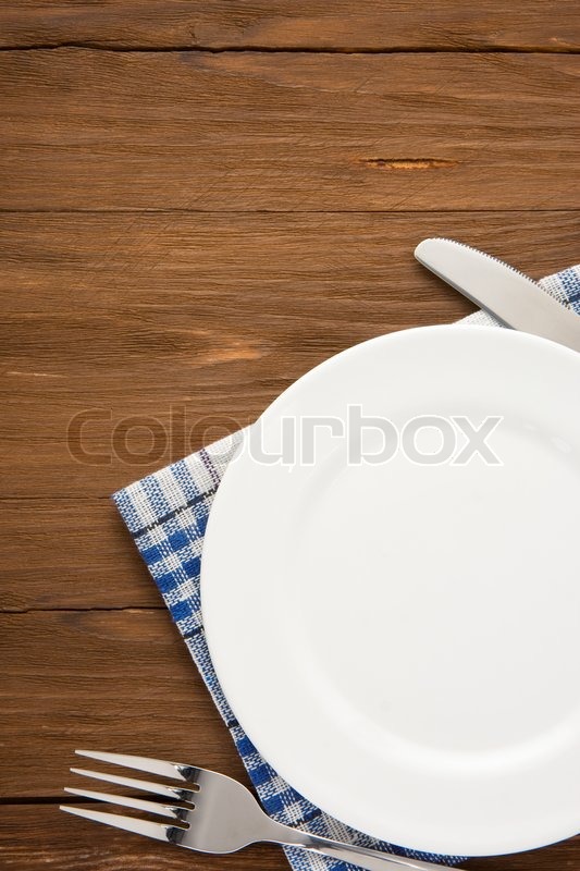 Weißen Teller , Messer und Gabel auf ... | Stock Bild | Colourbox