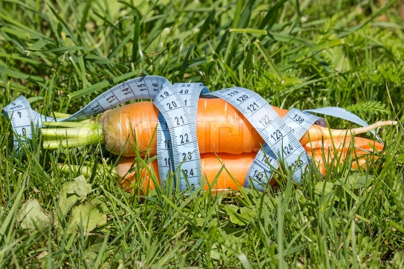 Gulerod på græsset | Stock foto | Colourbox