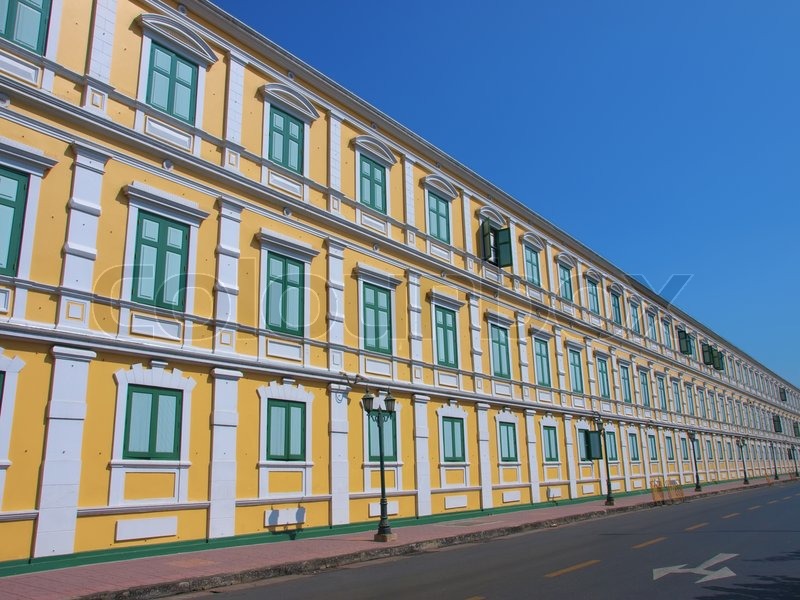 Yellow and white building and blue sky, ... | Stock image | Colourbox