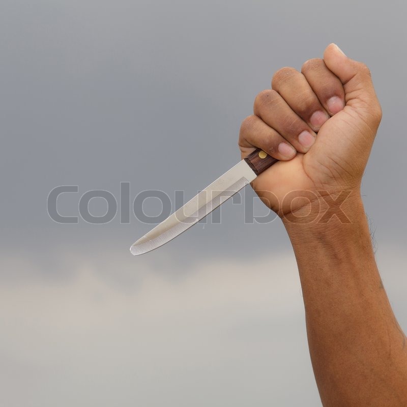 Messer in einer Hand | Stock Bild | Colourbox
