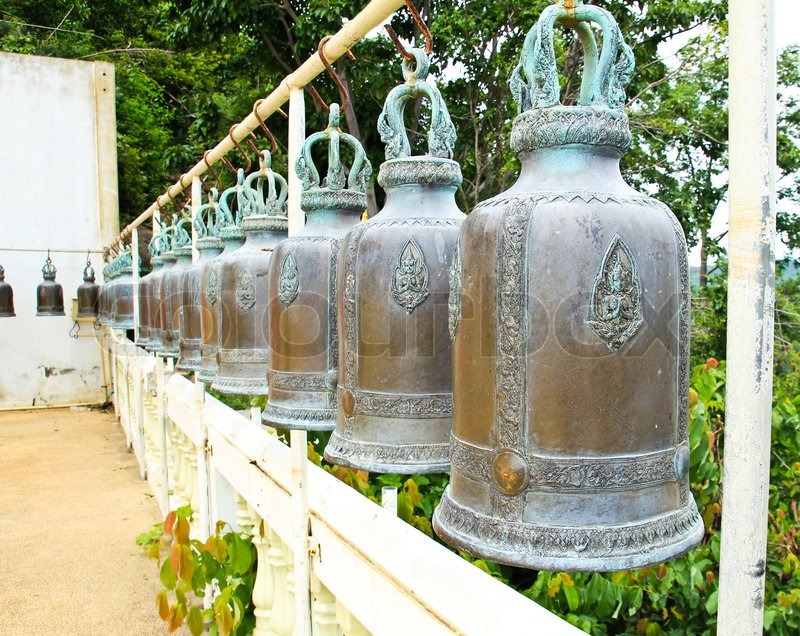 Temple bells hanged for everyone to ... | Stock image | Colourbox