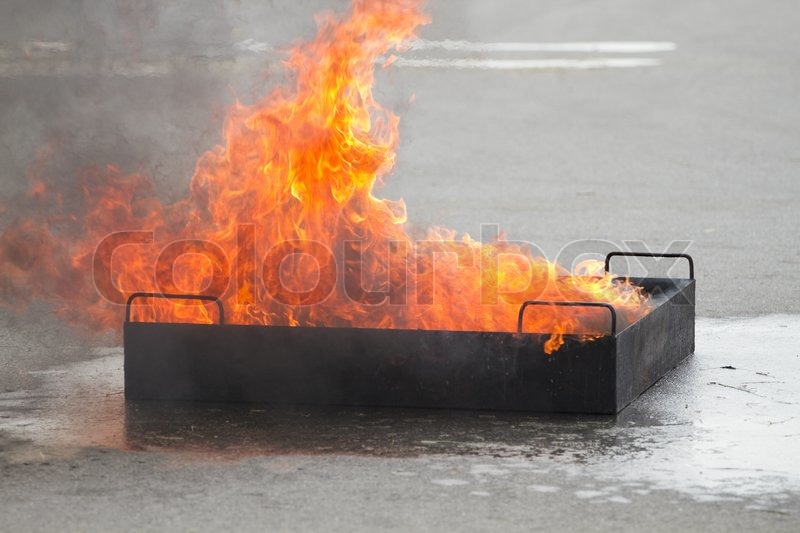 Fire flame in container on fire safety ... | Stock image | Colourbox