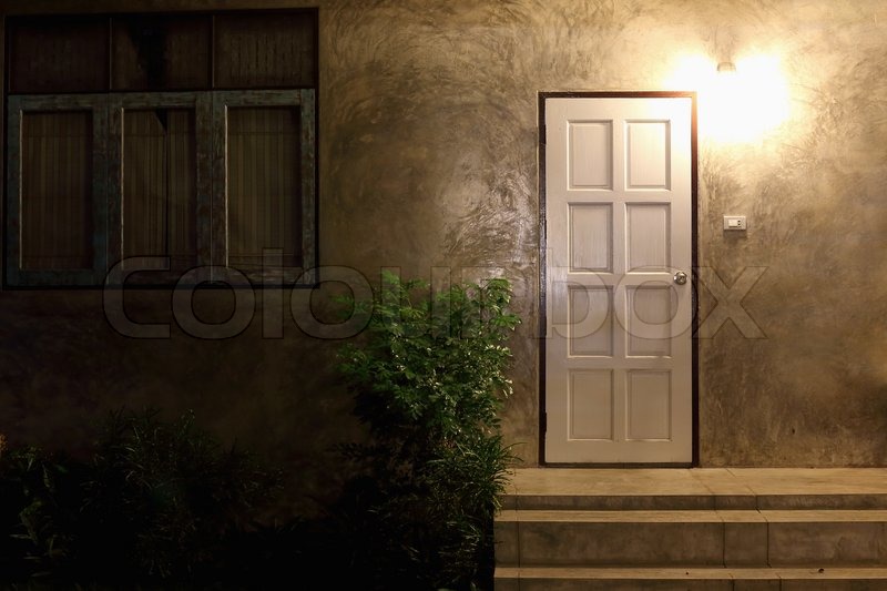 Entrance of a house at night | Stock image | Colourbox