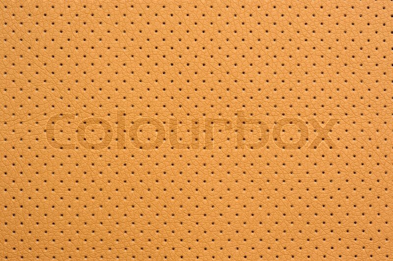 A macro shot of yellow perforated ... | Stock image | Colourbox