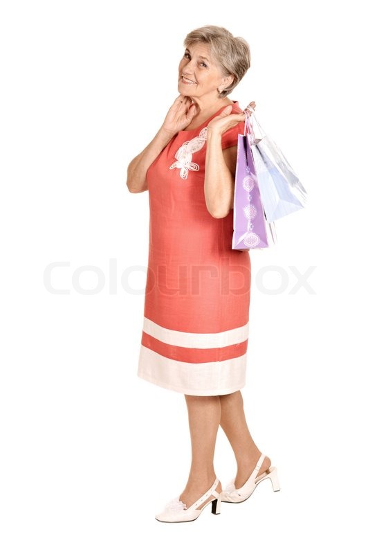 Portrait an older woman in a red dress ... | Stock image | Colourbox