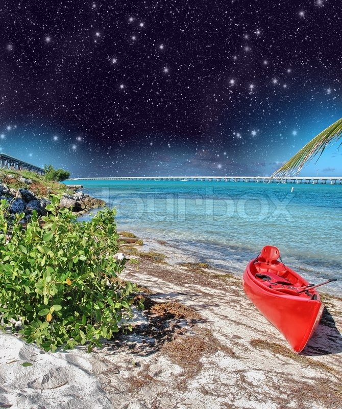 Red boat on a beautiful sea at night. | Stock image | Colourbox