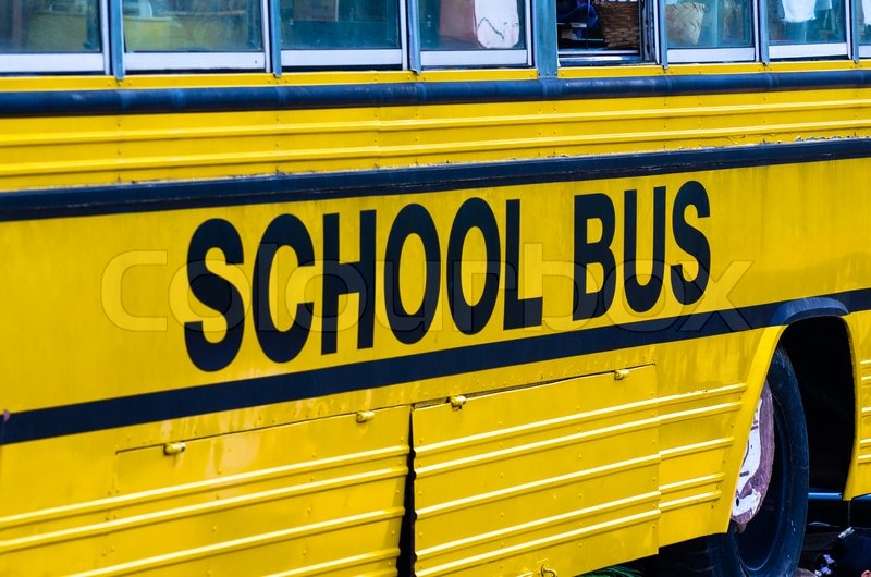 Yellow back of school bus with a sign | Stock image | Colourbox