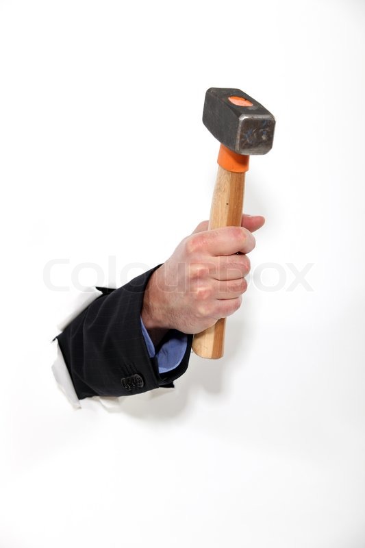 Businessman with a hammer | Stock image | Colourbox