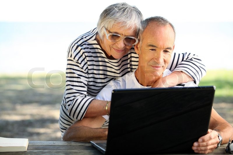 65 years old couple doing computer ... | Stock image | Colourbox