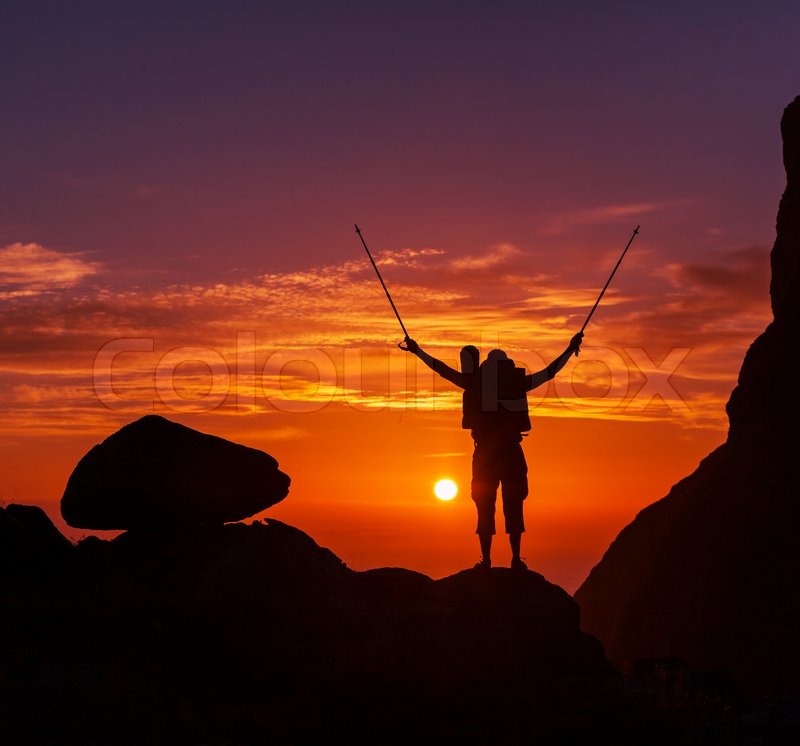 Hiker at sunset | Stock image | Colourbox