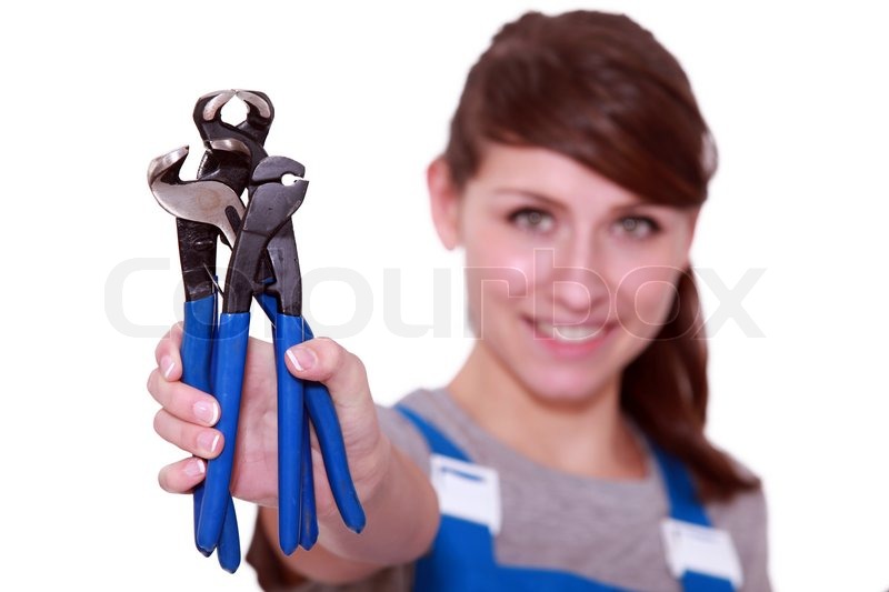 Woman with pliers | Stock image | Colourbox
