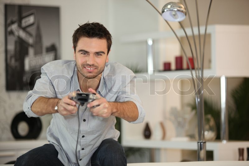 Wettbewerbsfähige Mann spielen von ... | Stock Bild | Colourbox