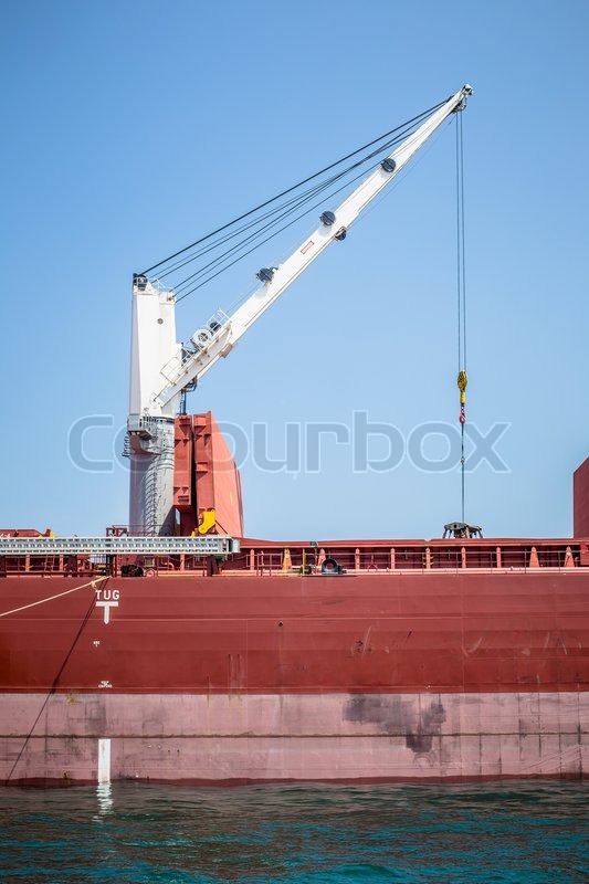 Lifting cranes on barges | Stock image | Colourbox