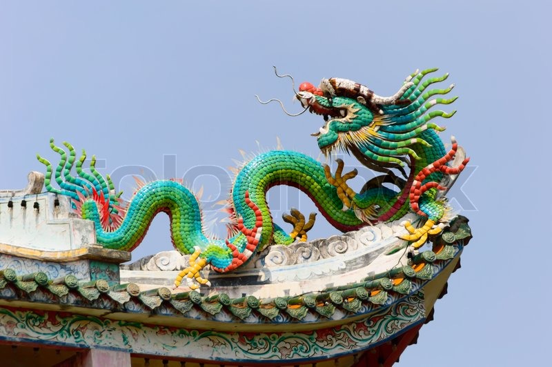 Dragon statue on china temple roof with ... | Stock image | Colourbox