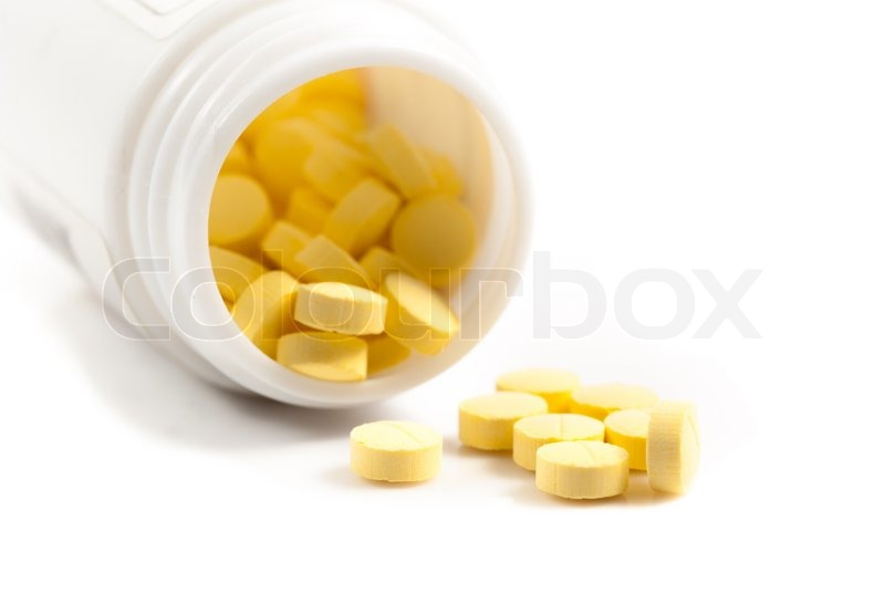 Yellow pills | Stock image | Colourbox