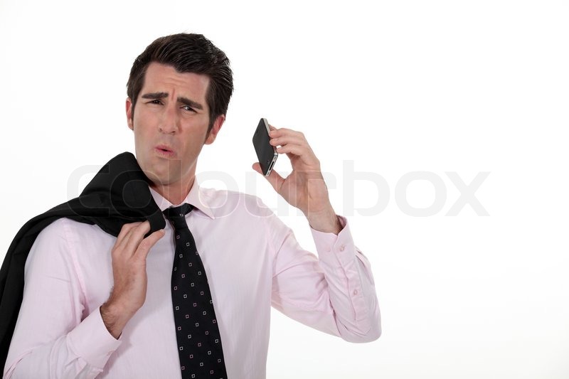 Businessman taking a bad phone call | Stock image | Colourbox