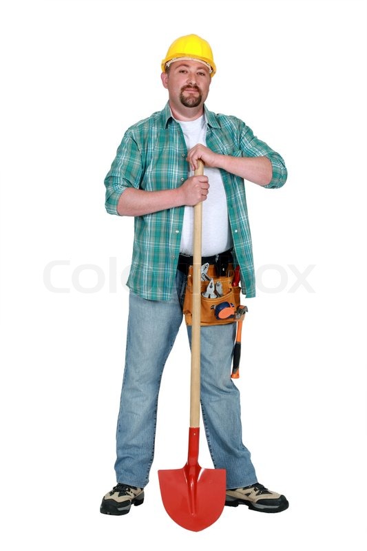 Mason stood with shovel | Stock image | Colourbox