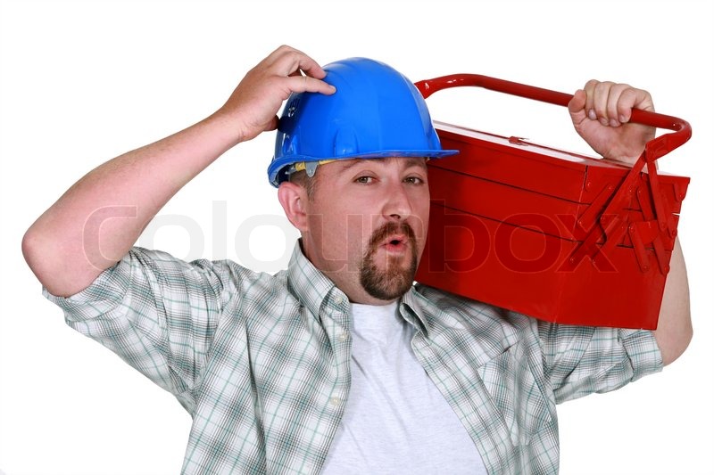 Man carrying tool box on shoulders | Stock image | Colourbox