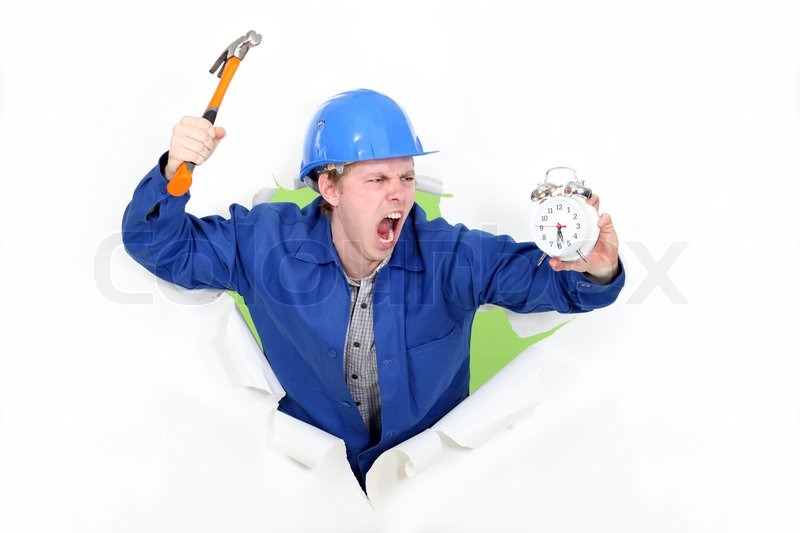 Angry man holding a hammer | Stock Photo | Colourbox