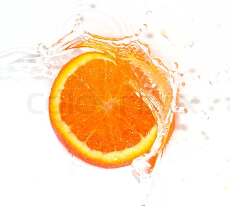 Orange in water on white background | Stock image | Colourbox