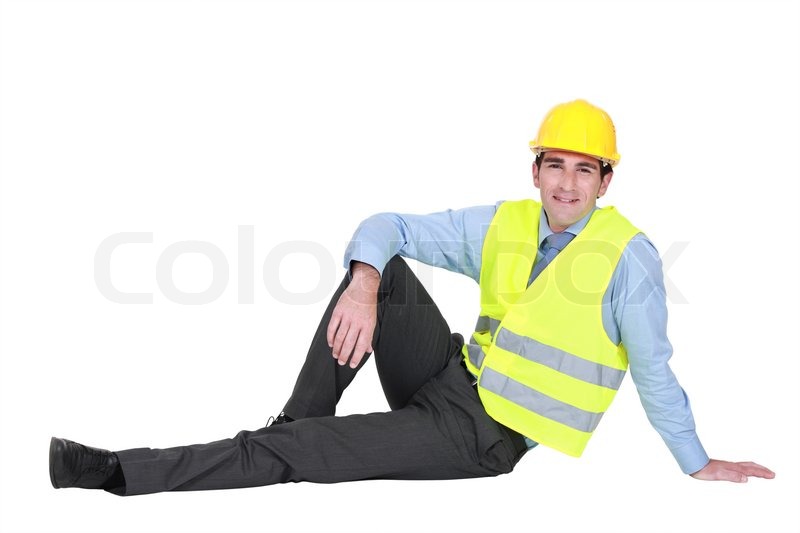 Engineer sitting on the ground | Stock Photo | Colourbox
