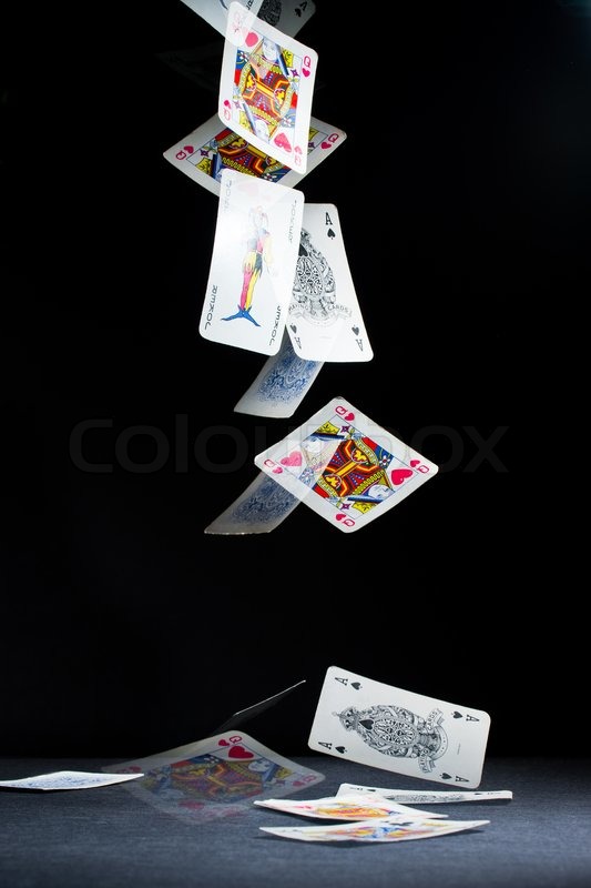 Playing cards falling | Stock image | Colourbox