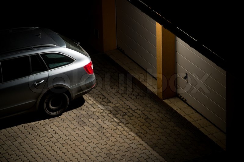 Night view of a car parked in front of ... | Stock image | Colourbox