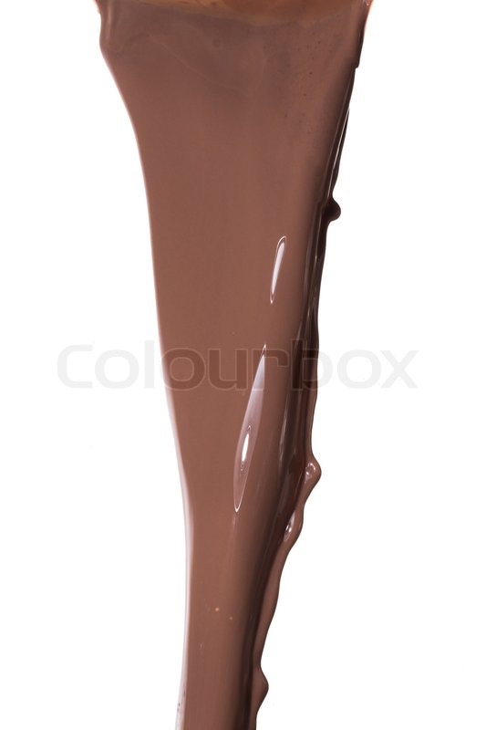 Pouring melted chocolate on white ... | Stock image | Colourbox